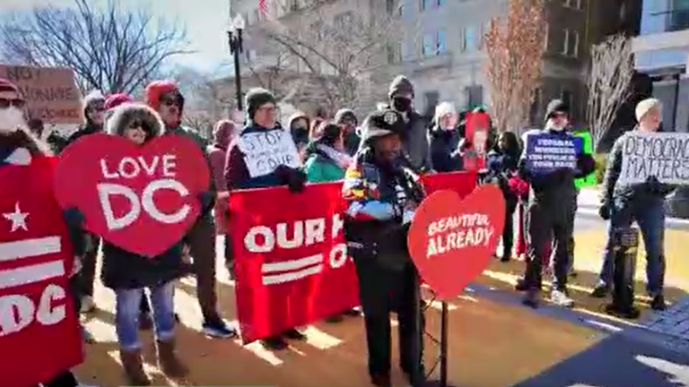 Free DC rally held to protest Trump executive order targeting District
