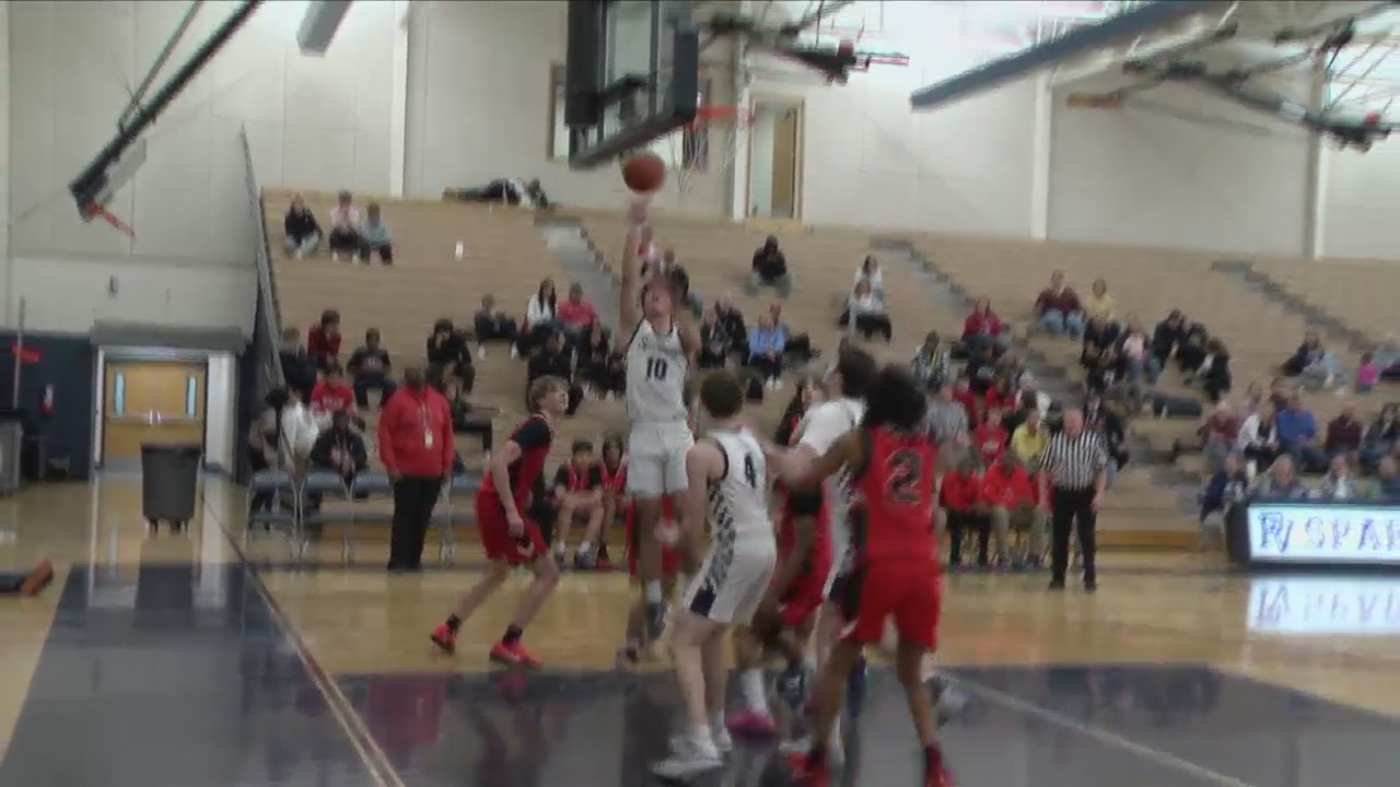 Pleasant Valley Spartans basketball downs Davenport West Falcons 70-56