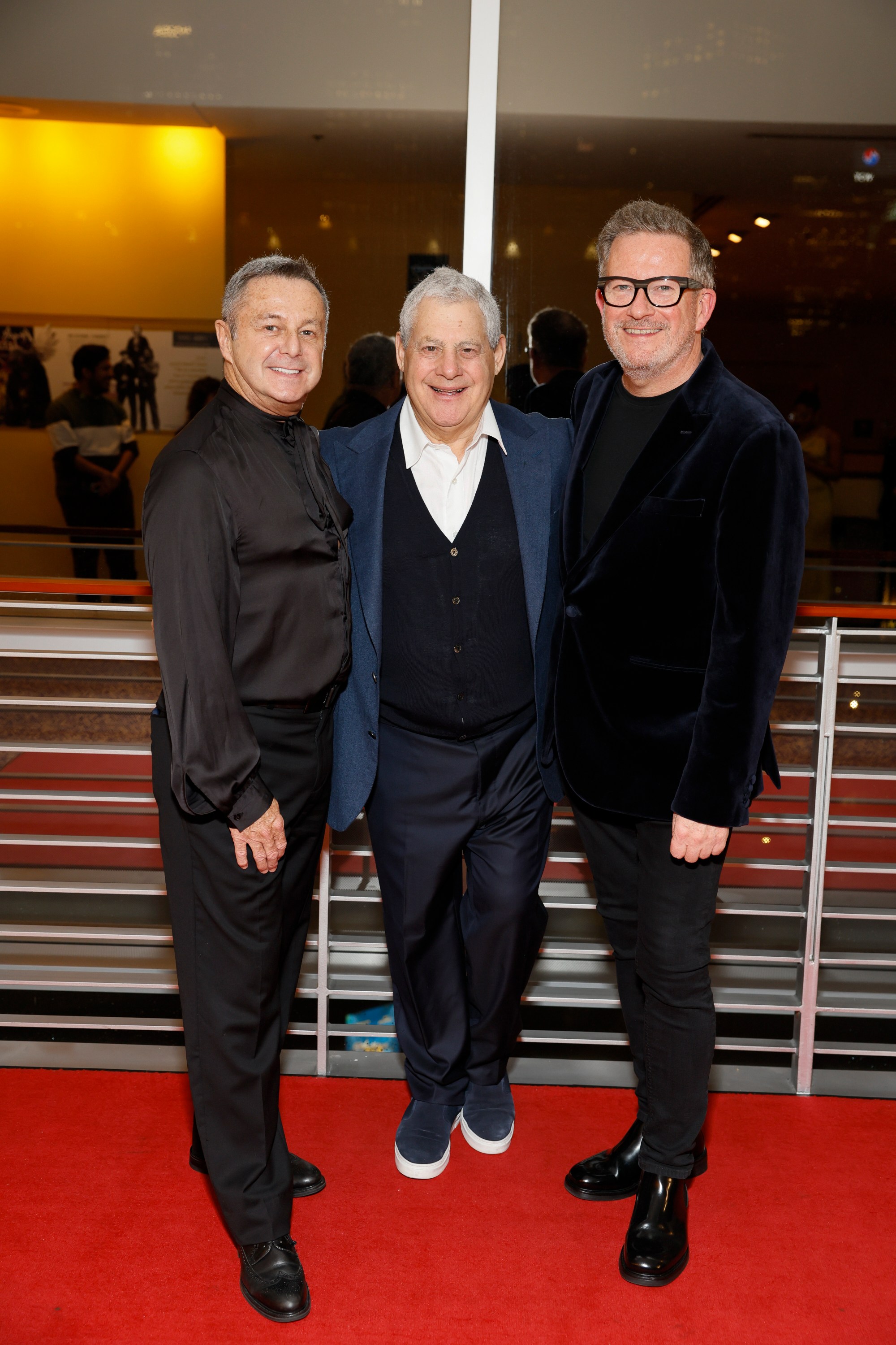 Jesse Tyler Ferguson, Ashley Park, Andrew Rannells Brave Rain to See ...