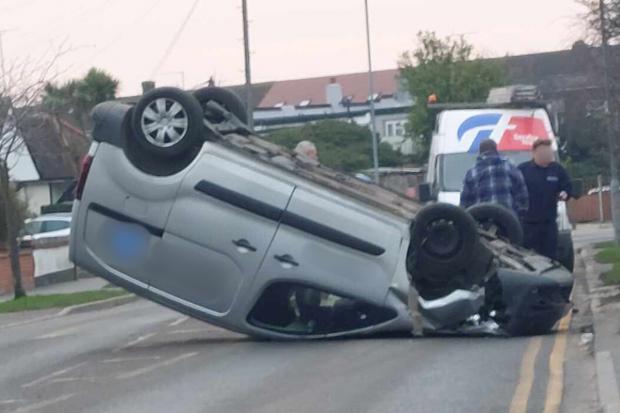 Photos show van flipped on roof after crash on south Essex road