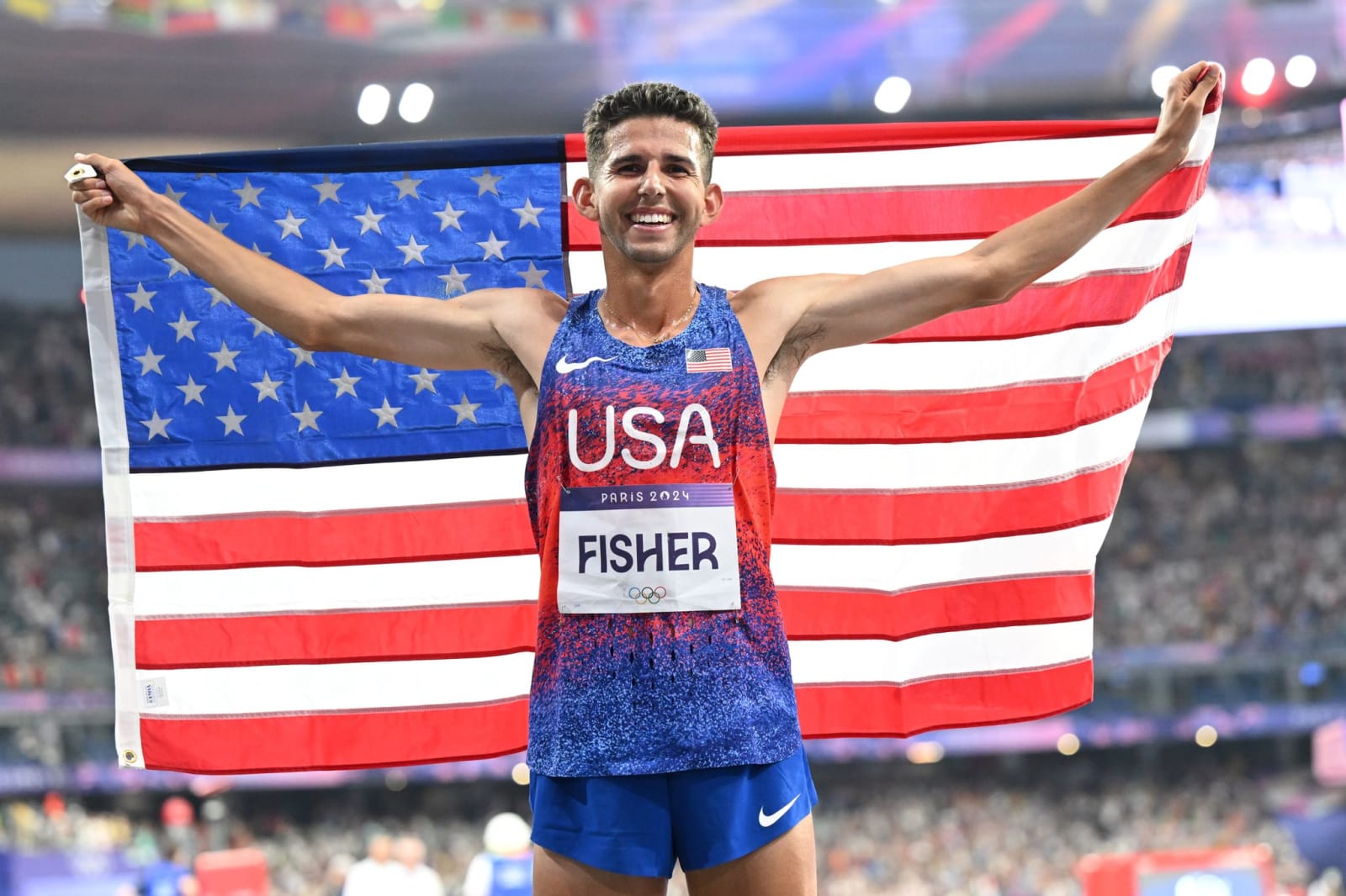 Grant Fisher smashes world indoor 5000m record in Boston