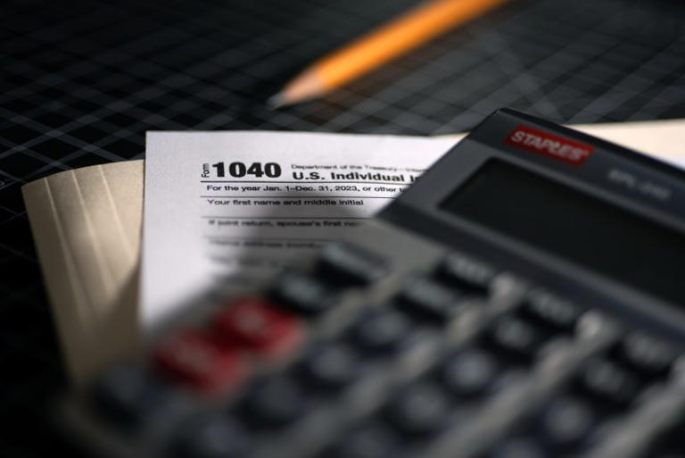 What is a FICA tax? What does it pay for?
