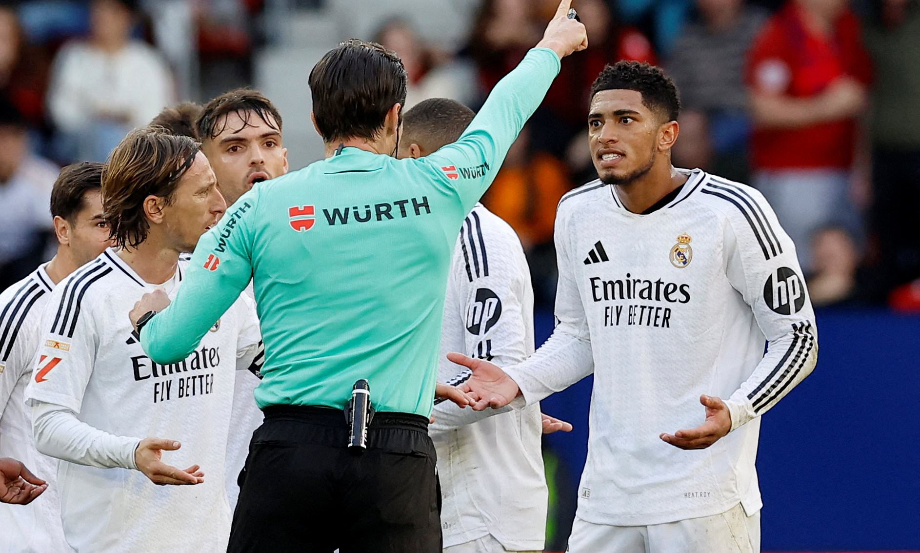 Jude Bellingham is shown a straight red card following angry ...