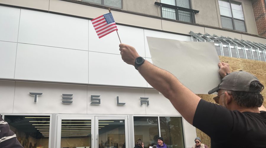 Protesters gather outside Austin-area Tesla store