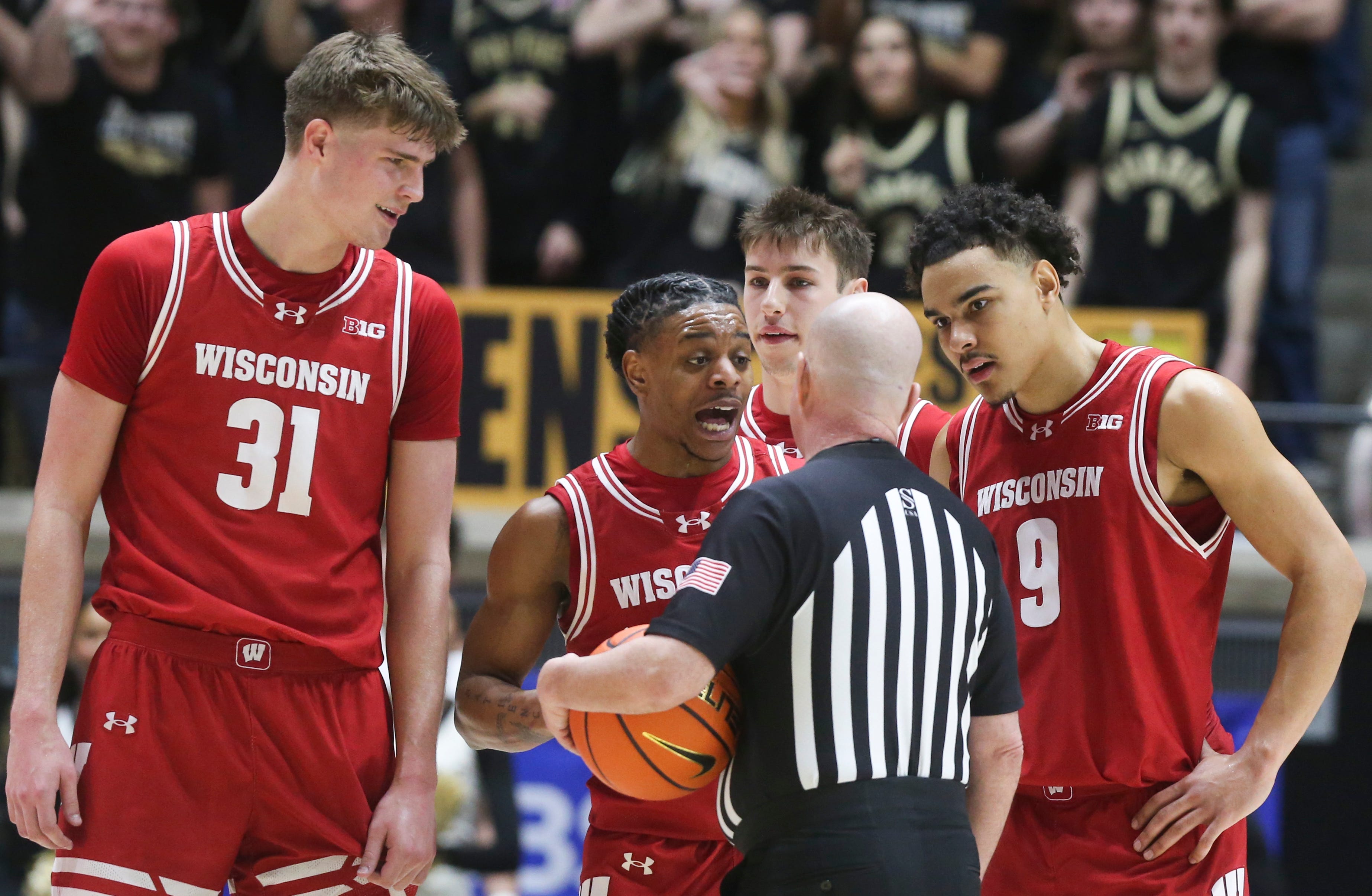Wisconsin fans, national media debate referees’ decision to eject ...
