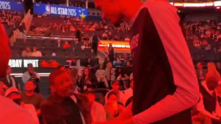 5-foot-3 Muggsy Bogues disappears in 7-foot-3 Wembanyama's arms