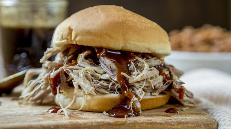 The Mouthwatering Condiment That Belongs On Pork Sandwiches