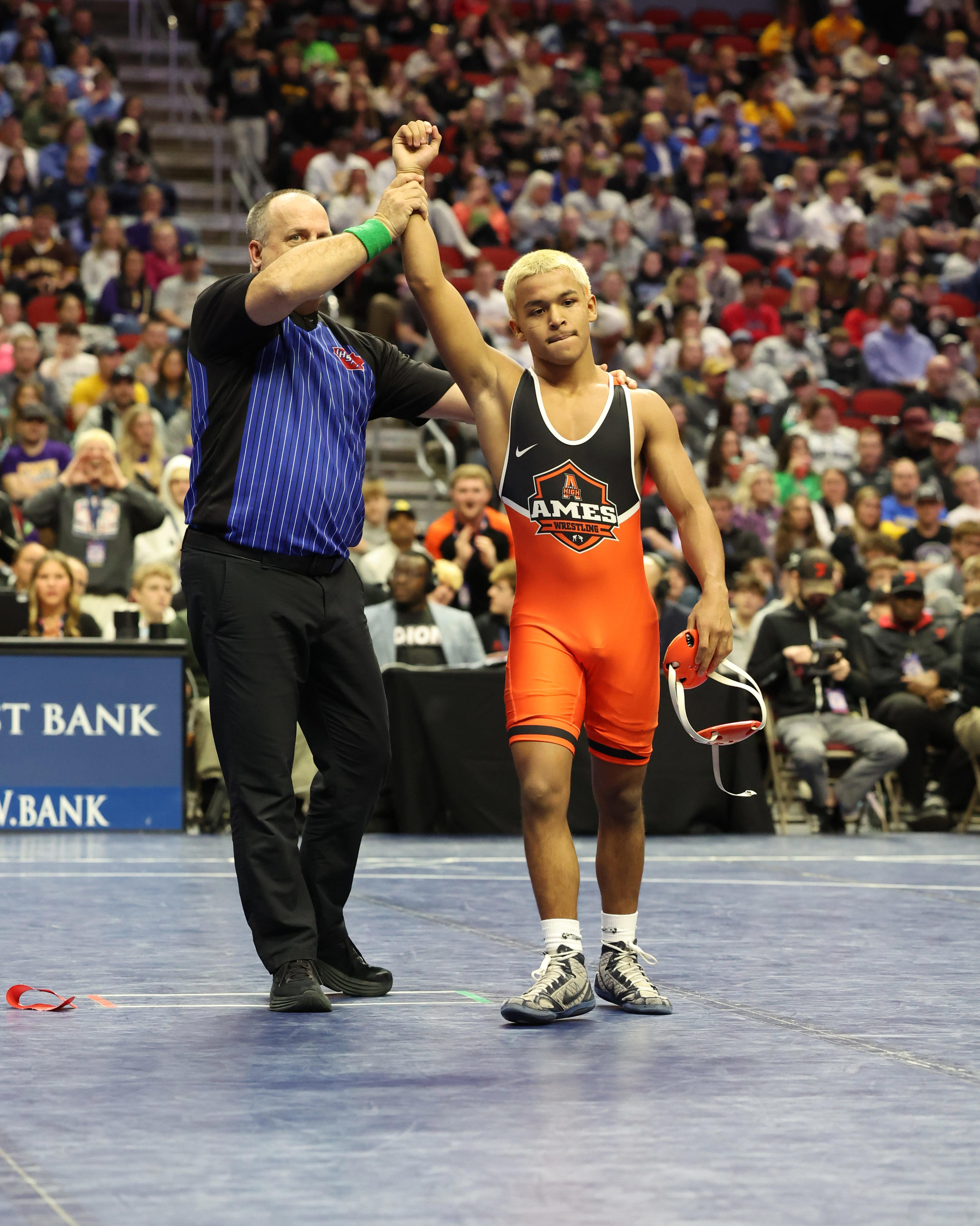 Ames' Christian Castillo wins title after dominant run at Iowa state wrestling tournament