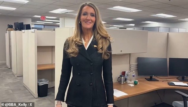 Cabinet member Kelly Loeffler gives tour of empty office to make point