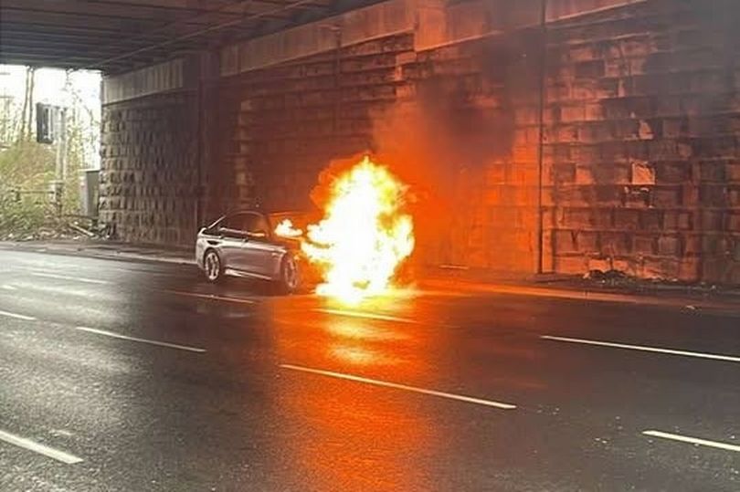 Dramatic photos show moment car bursts into flames on M60