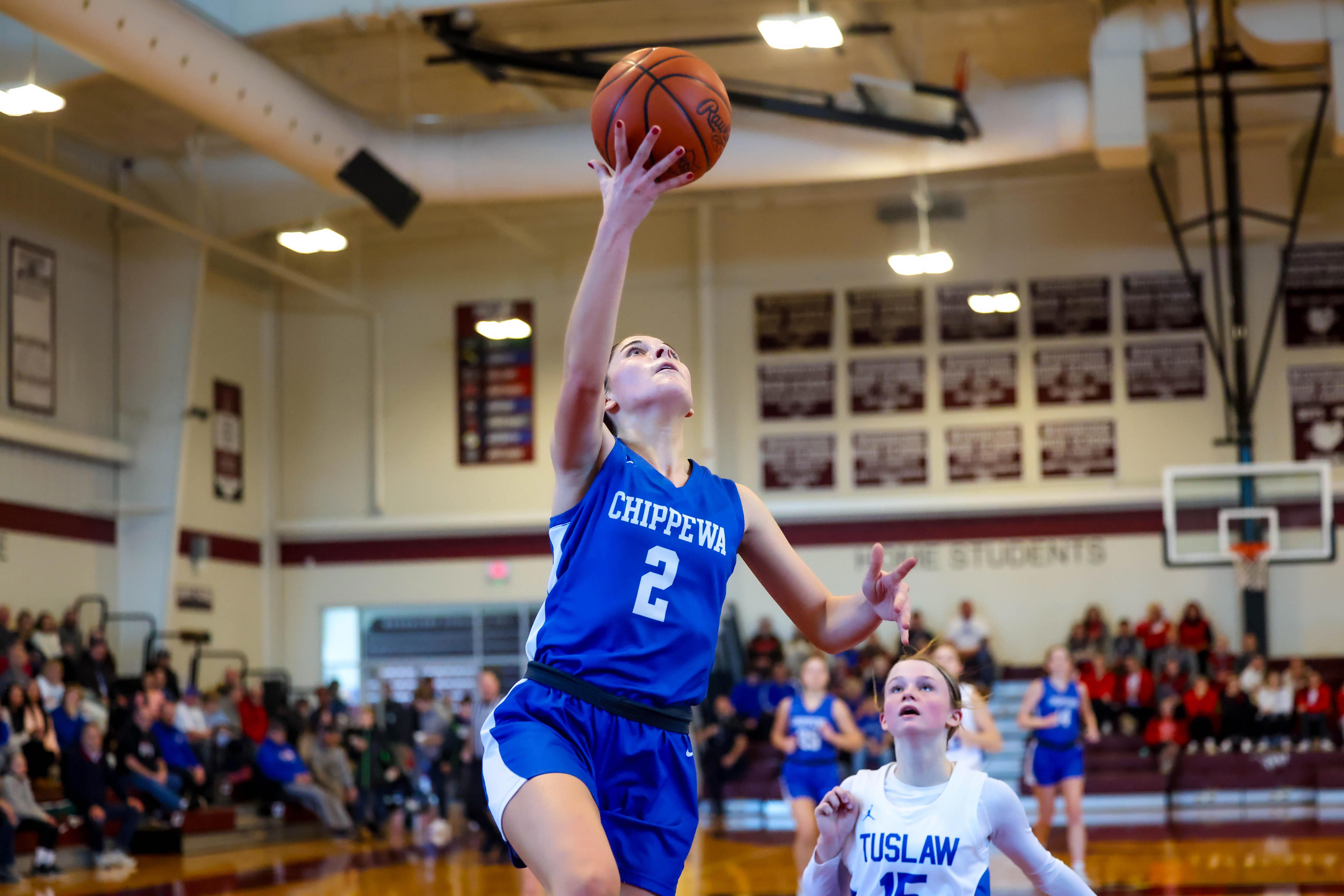 Elena Moyer and Bree Regan deliver buckets to lift Chippewa