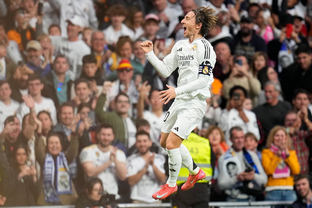Modric stunner maintains Real Madrid title charge