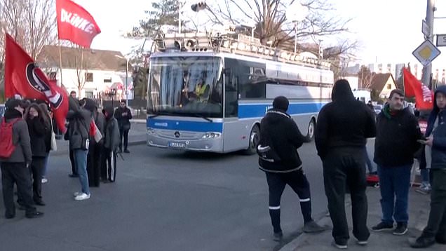 Protest bus blasts anti-AfD slogans outside party headquarters