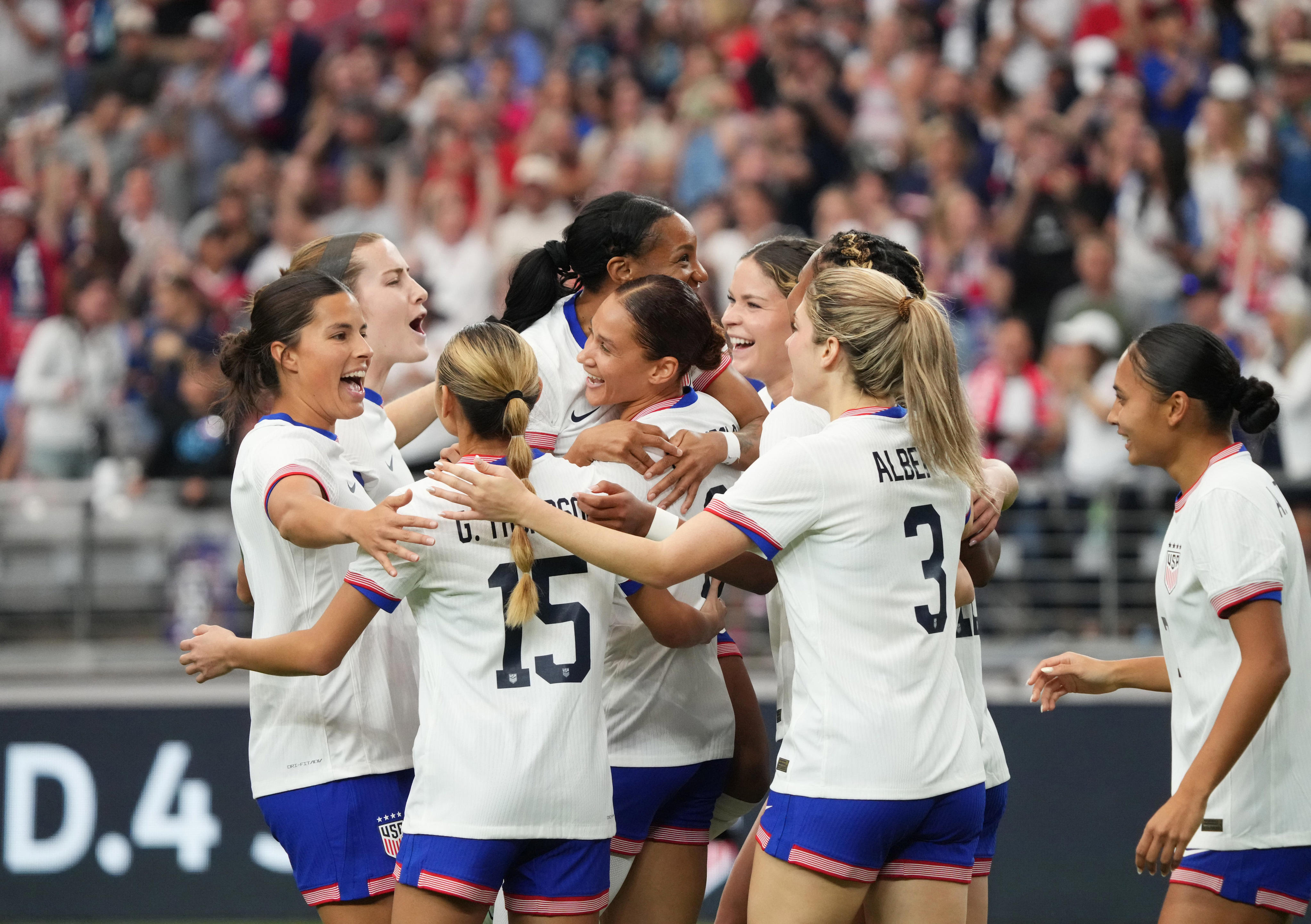 US women's soccer team holds on for win over Australia before record ...