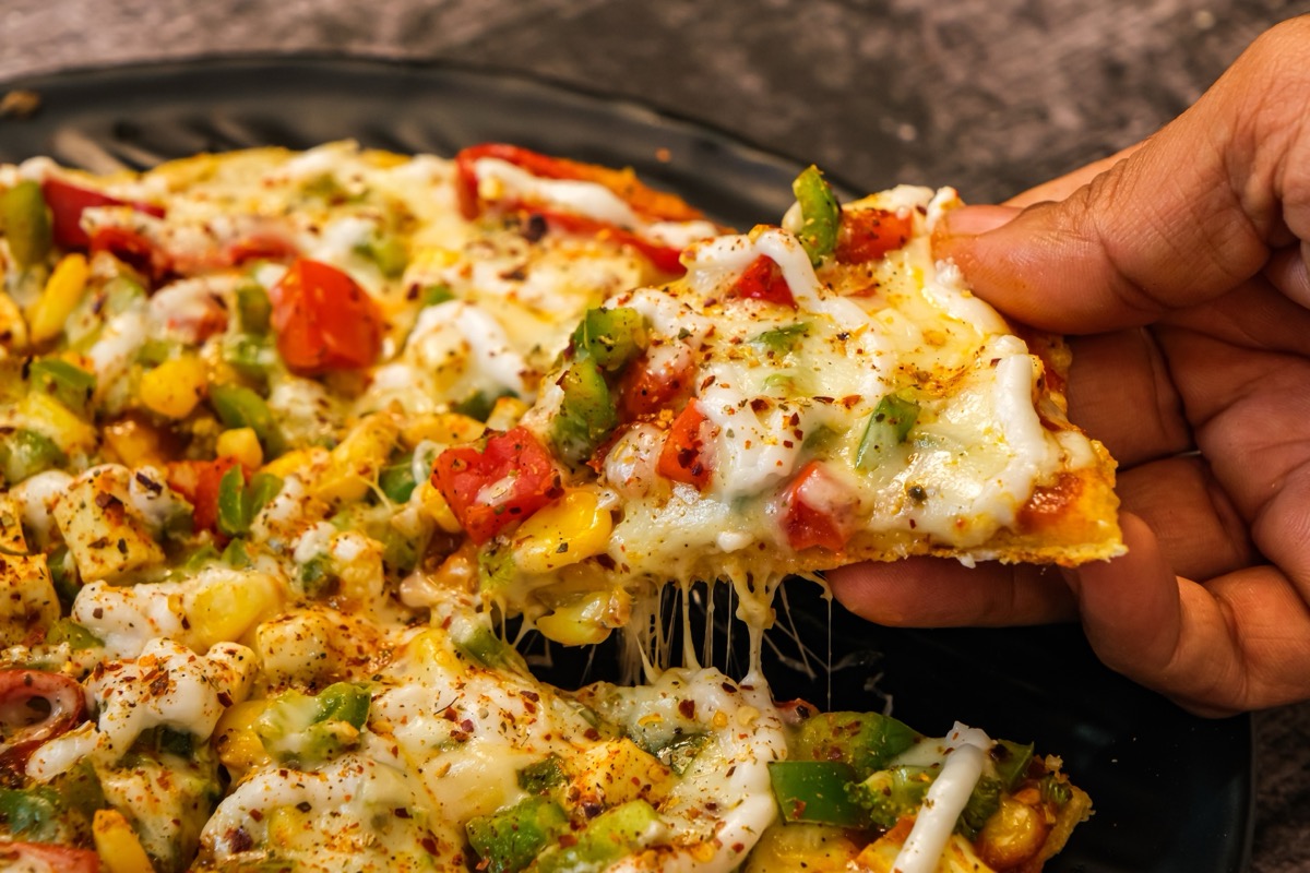 The #1 Pizza Chain Fans Say Has the Best Crust—Do You Agree?