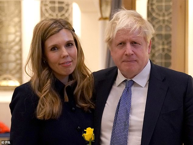 Boris Johnson hugs son on boat on holiday after 'miserable' Christmas