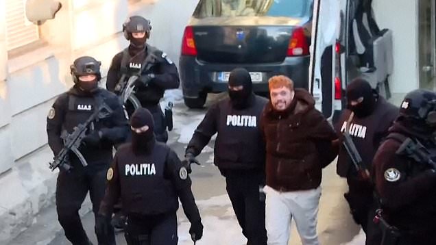 French gangster 'The Fly' smiles for cameras after Romania arrest