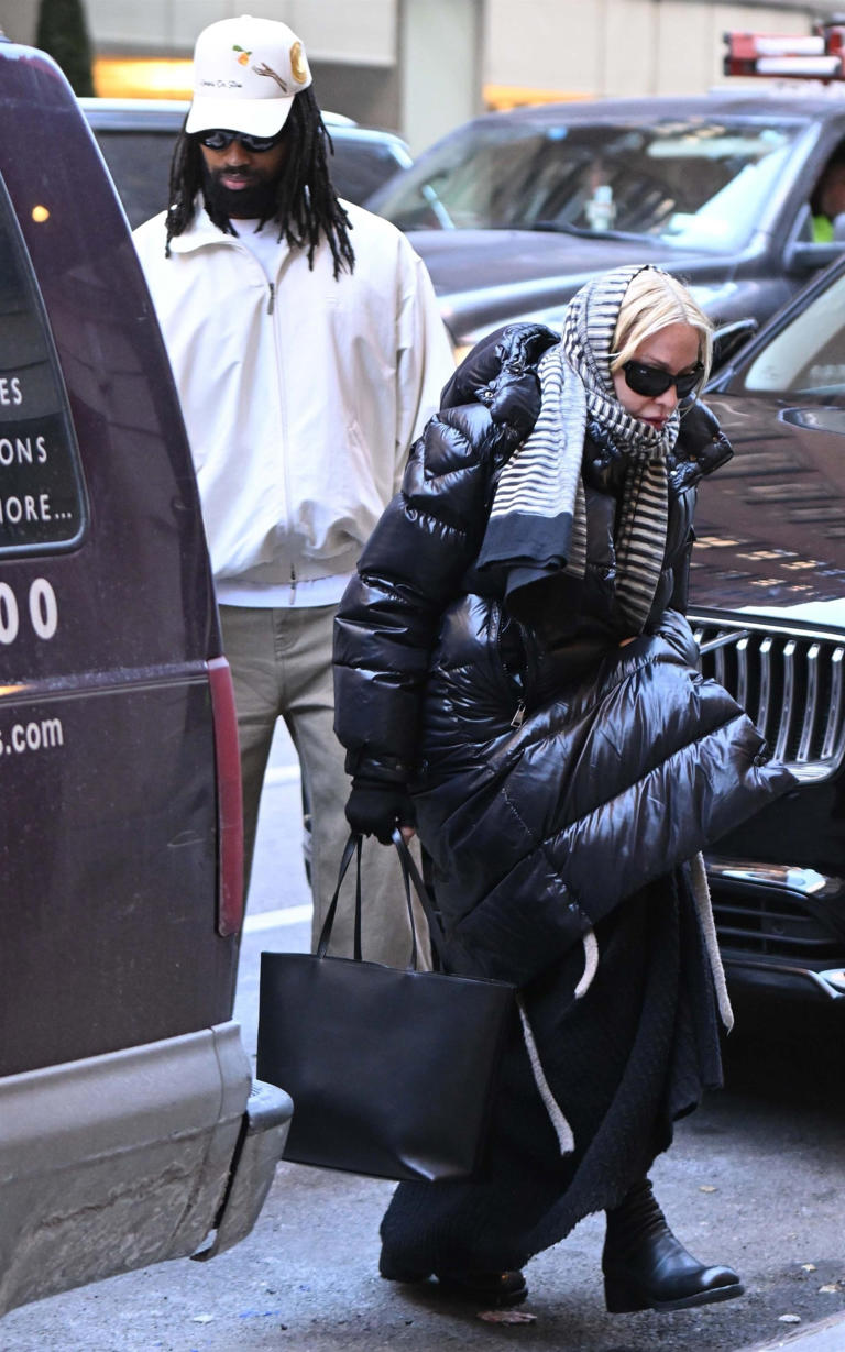 Madonna, 66, bundles up with boyfriend Akeem Morris, 28, in NYC