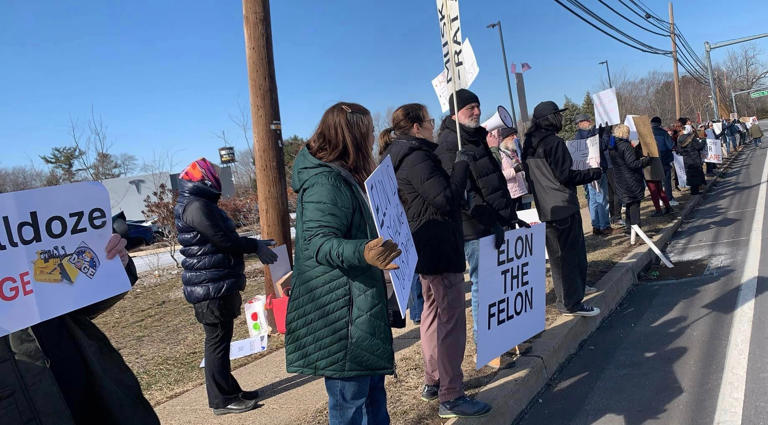 Musk, Trump Blasted At Tesla Protest In Warminster