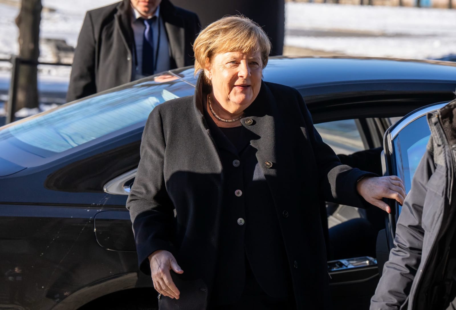 Germany's Merkel congratulates former rival Merz on election victory