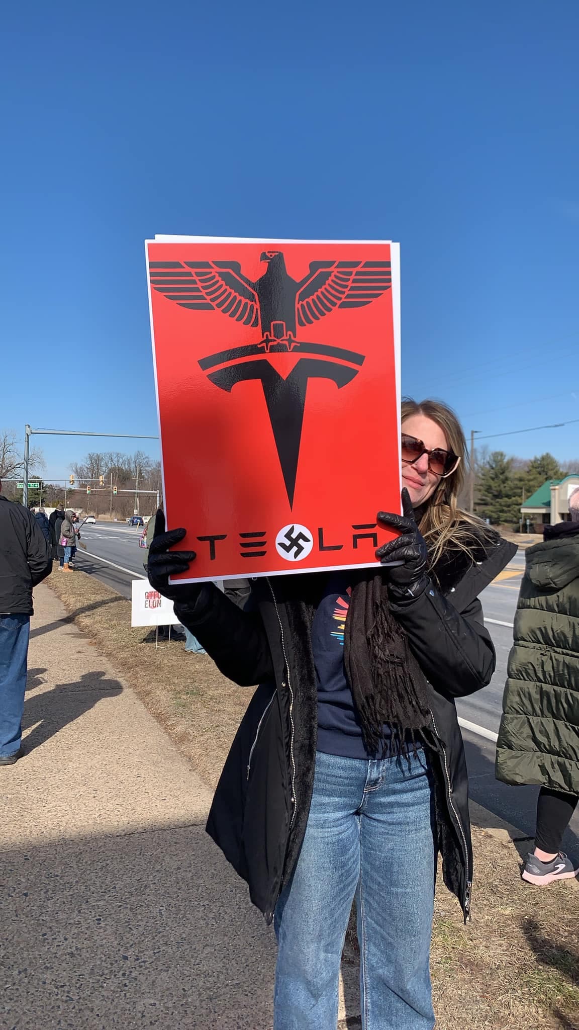 Musk, Trump Blasted At Tesla Protest In Warminster