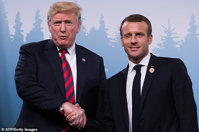 Trump's awkward 'death clasp' handshake with Macron goes viral