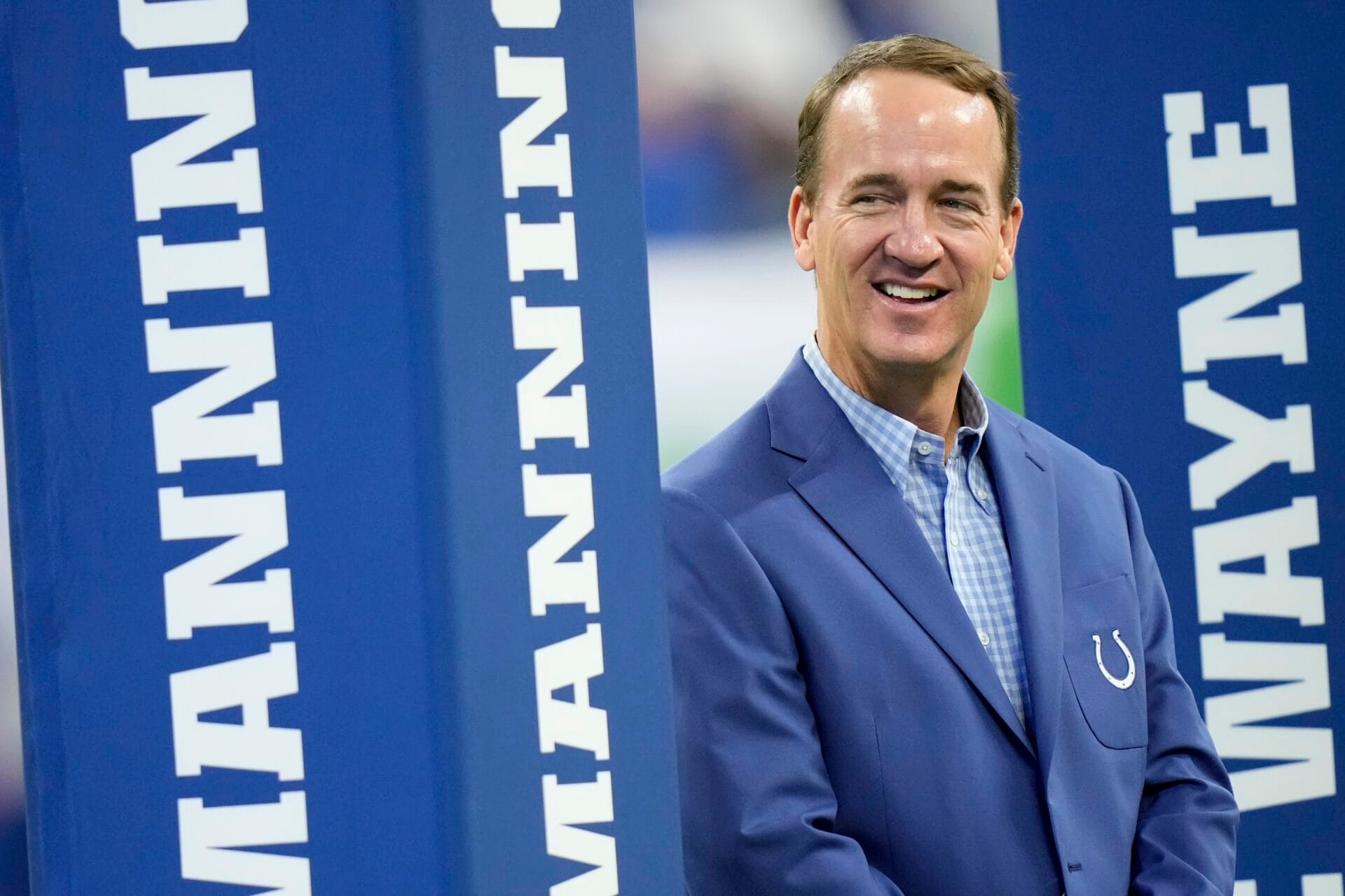 Peyton Manning back at Lucas Oil Stadium for Tennessee basketball