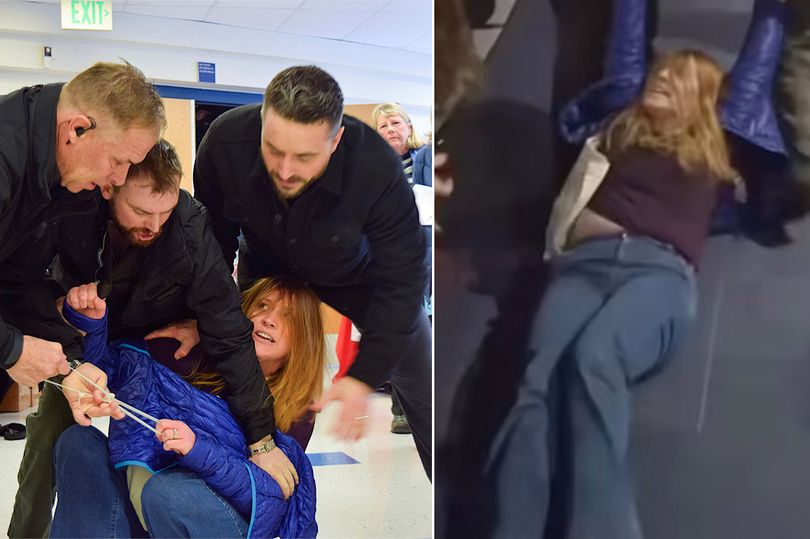 Idaho town hall meeting turns into brawl as a heckling woman is dragged out