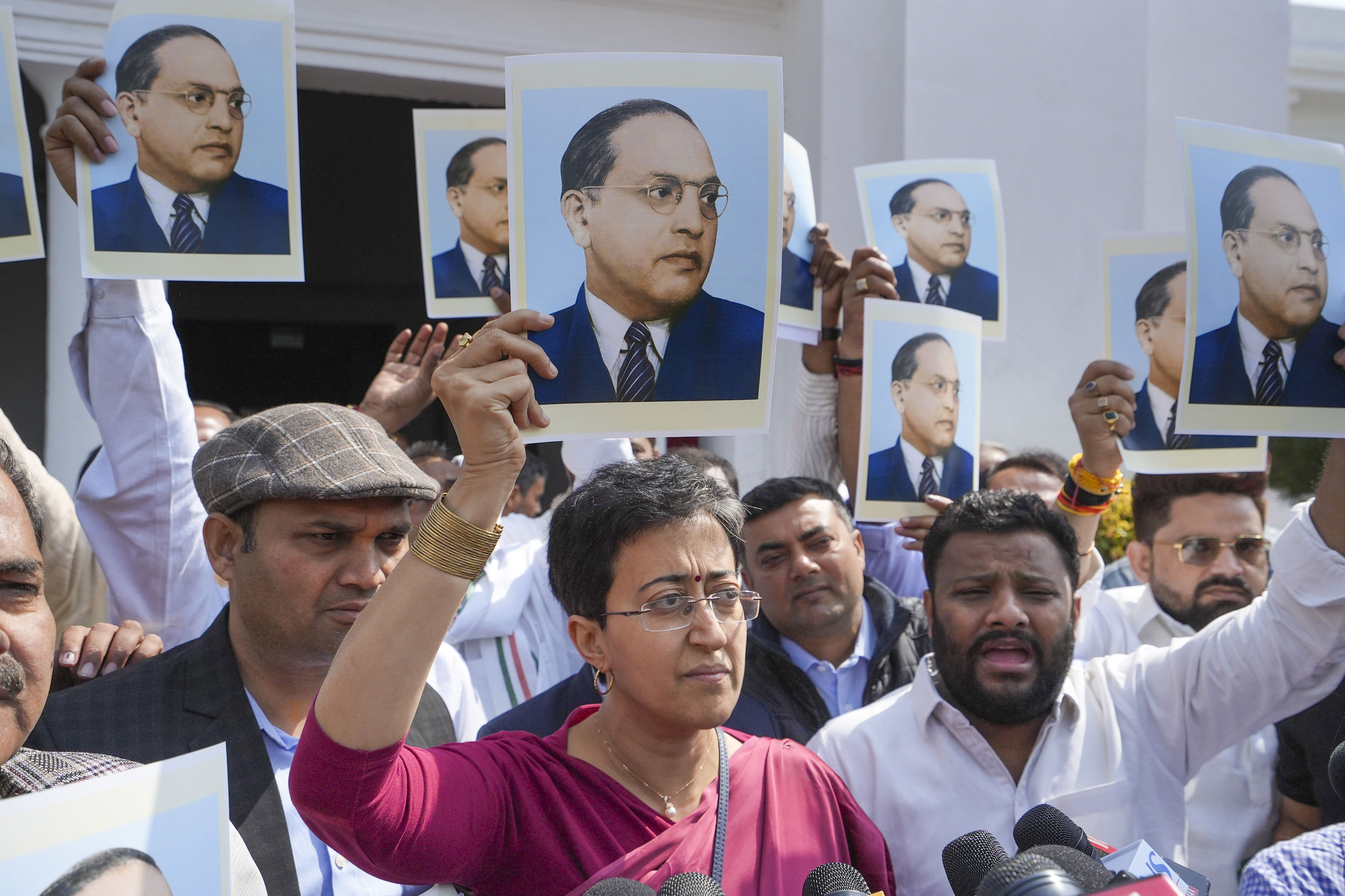 BJP, AAP spar in Delhi Assembly over Ambedkar, Bhagat Singh portraits ...