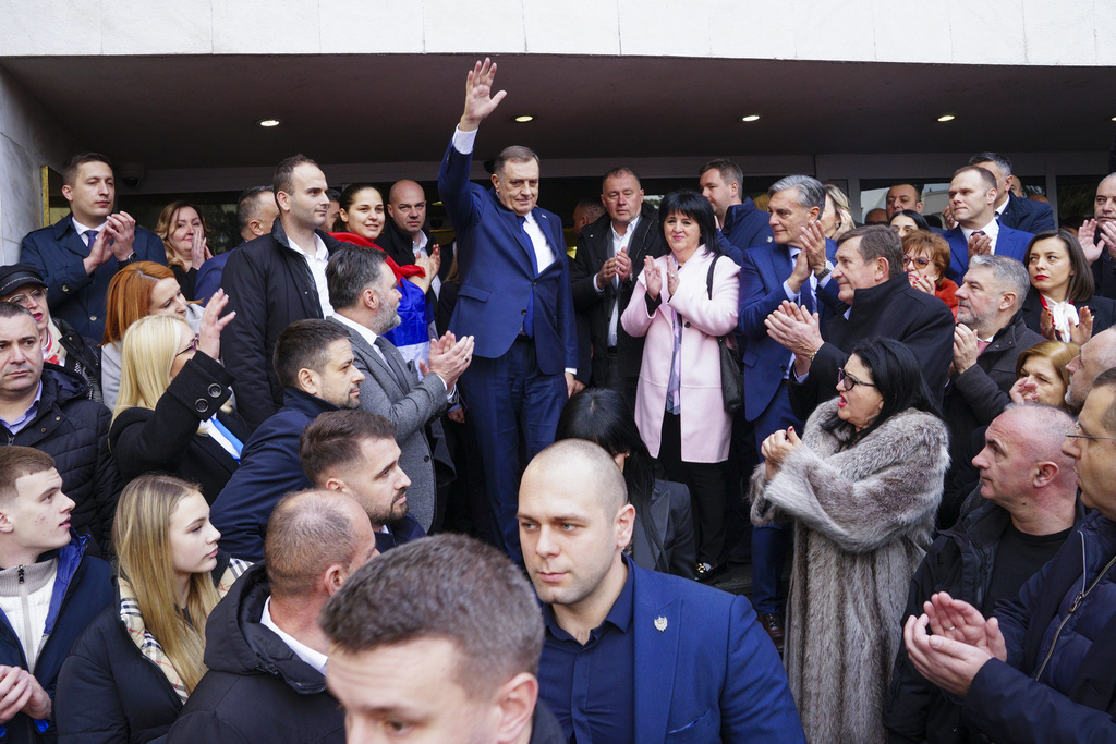 Supporters of separatist Bosnian Serb president Dodik rally as he ...