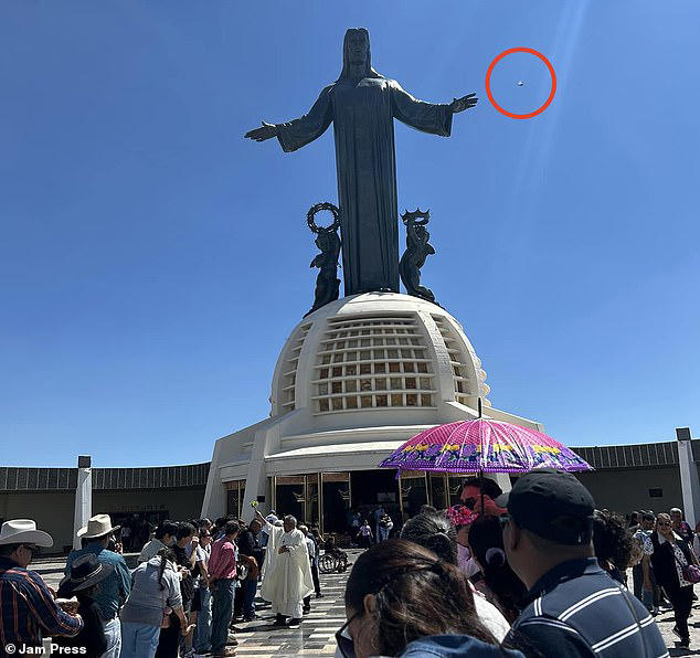 UFO captured above Jesus statue at religious landmark