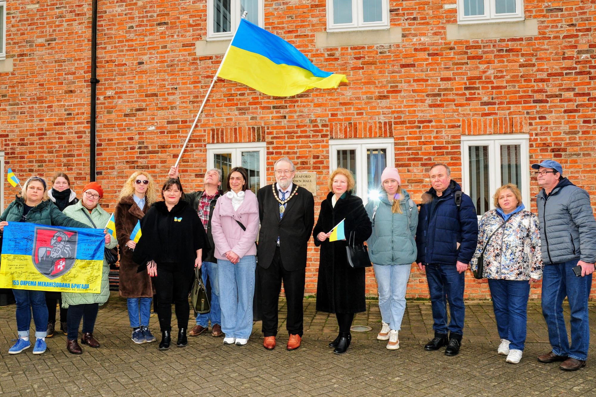Flag raising ceremony marks third anniversary of start of Russia's war ...