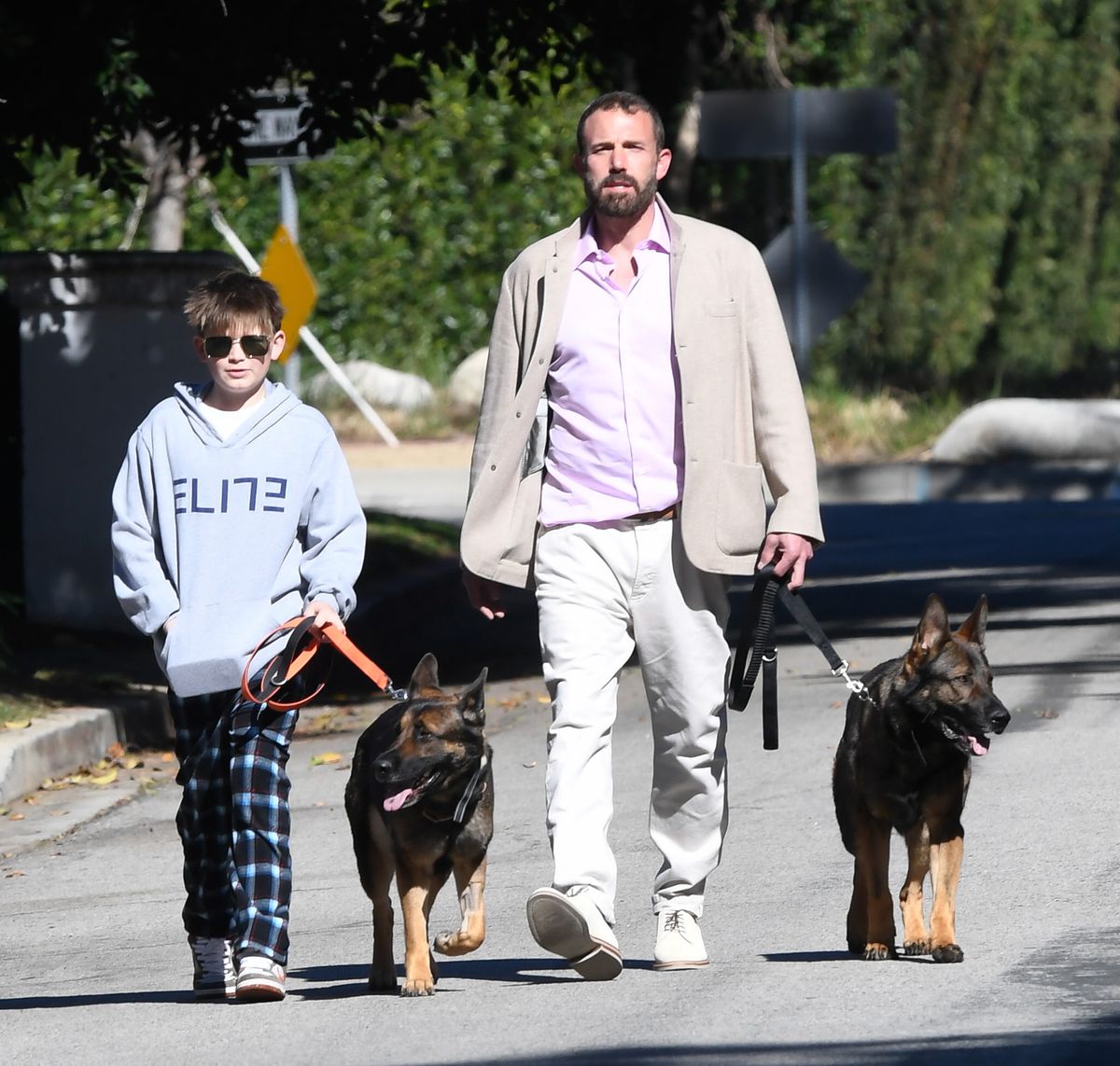 Ben and Samuel Affleck go on a walk with their gorgeous matching dogs