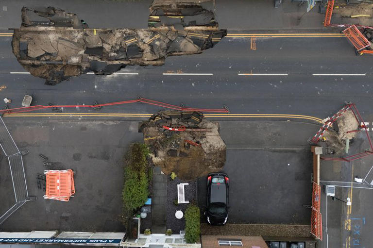 Massive Godstone sinkhole that swallowed parts of street could take a ...
