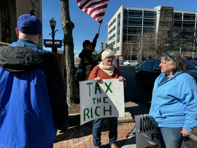 Protestors gather outside Representative Miller-Meeks' office Tuesday ...