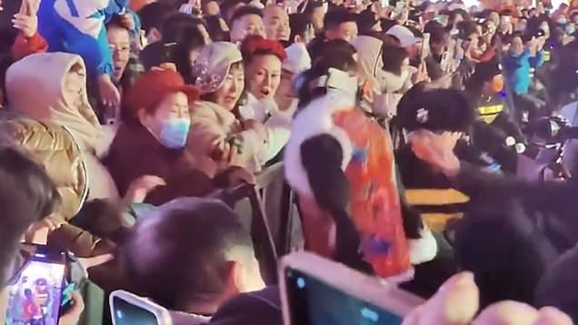 Moment Security Drags Away Humanoid Robot After It Attacks Crowd