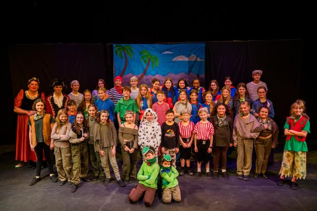 Scouts and Guides team up for 'entertaining' pantomime - Oh yes they did!