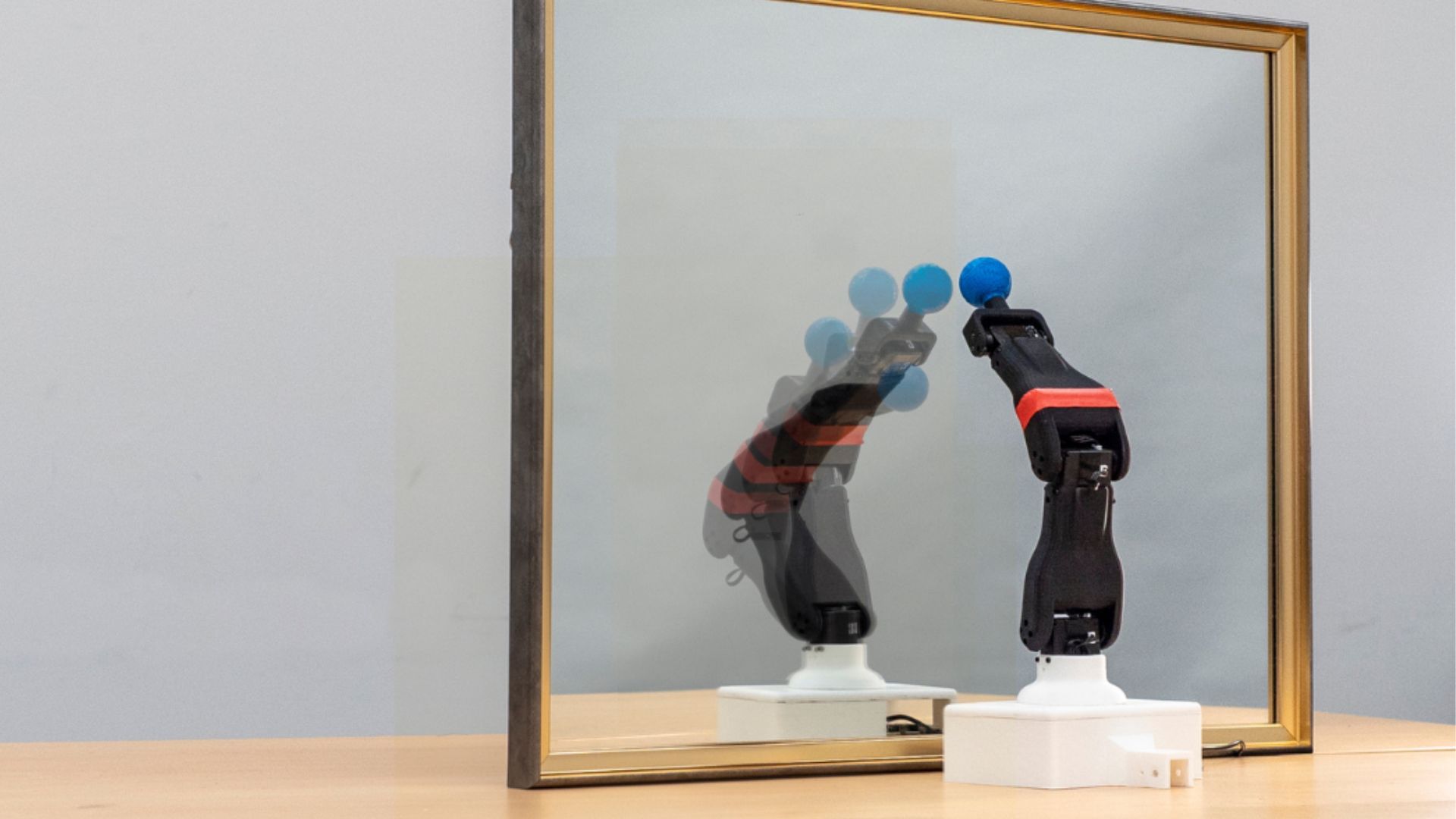 Robot watches itself like humans do in a mirror to master movements ...