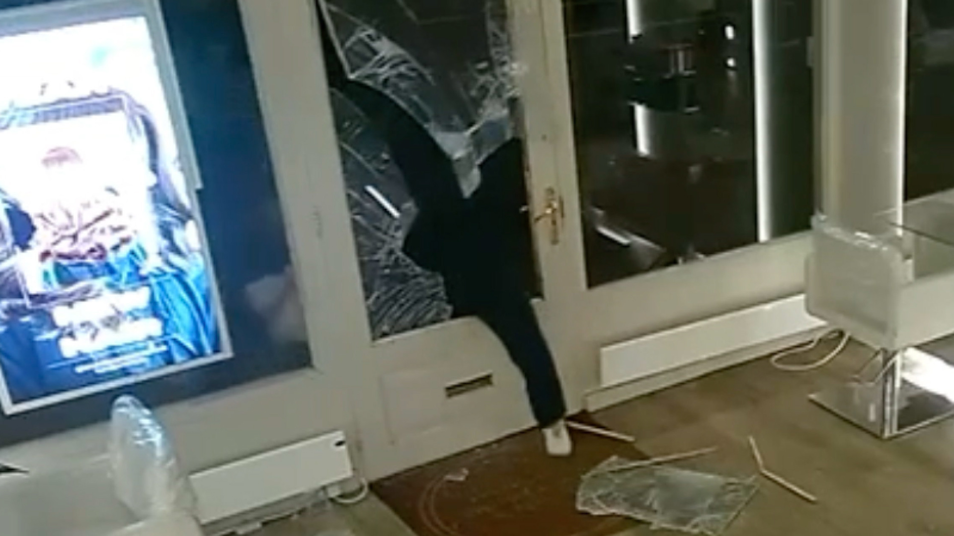 CCTV shows thieves smashing glass door and raiding salon for pricey ...