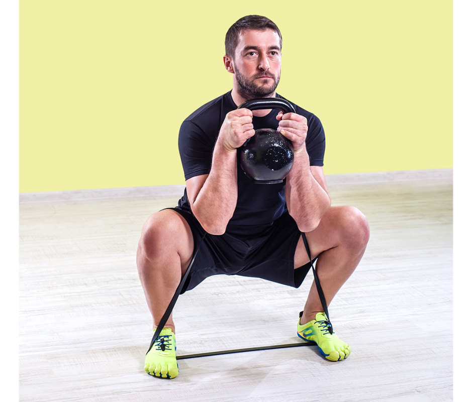 The Gym Hack That Turns Your Squats Into a Full-Body Power Move
