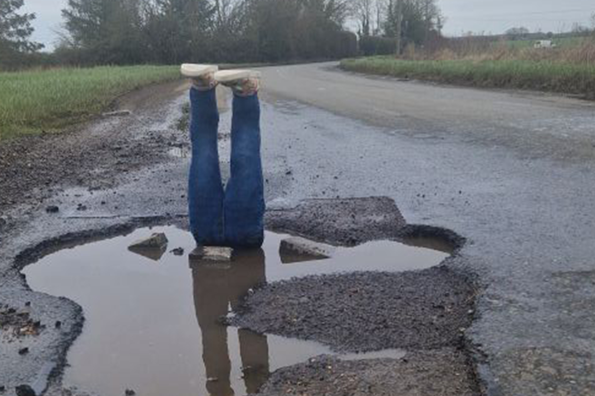 Trouble afoot! Man fed up with pothole finally gets officials ...