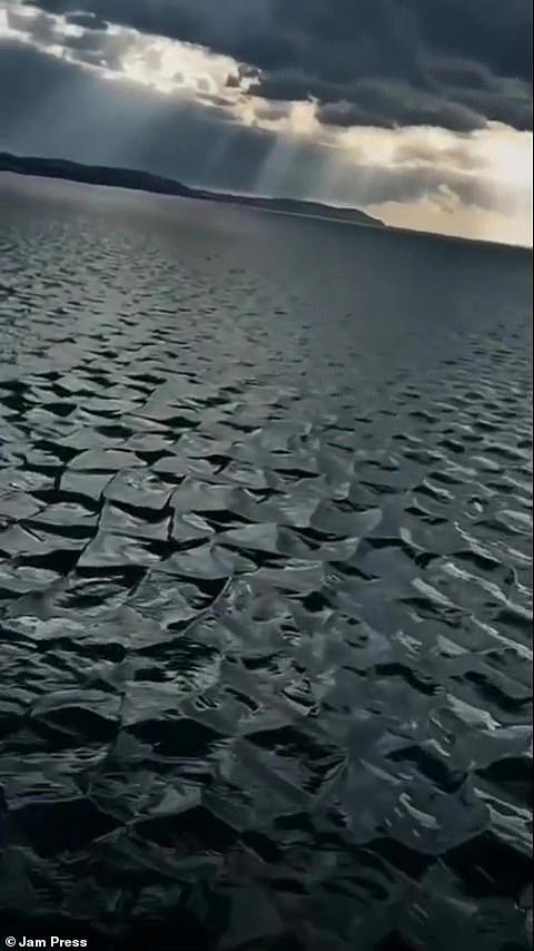 Bizarre moment fishermen are surrounded by dangerous 'square waves'