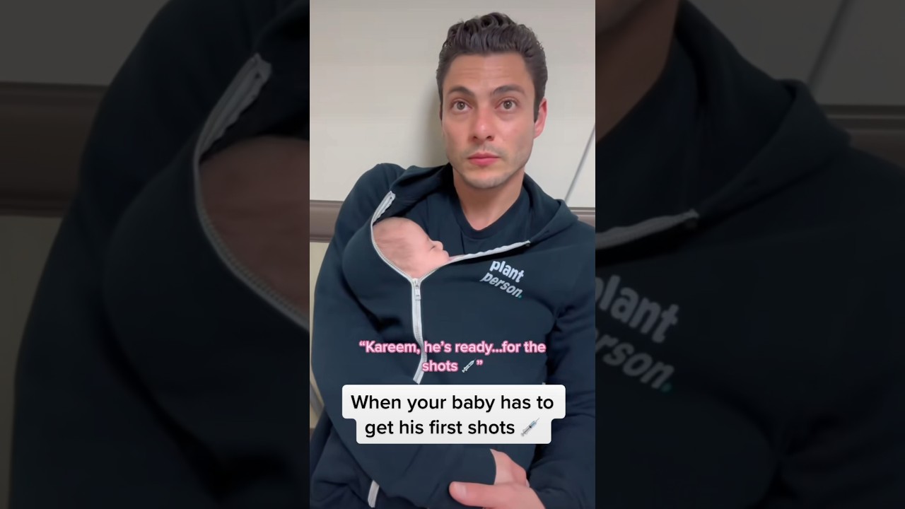 Dad bravely survives baby’s emotional first doctor shots