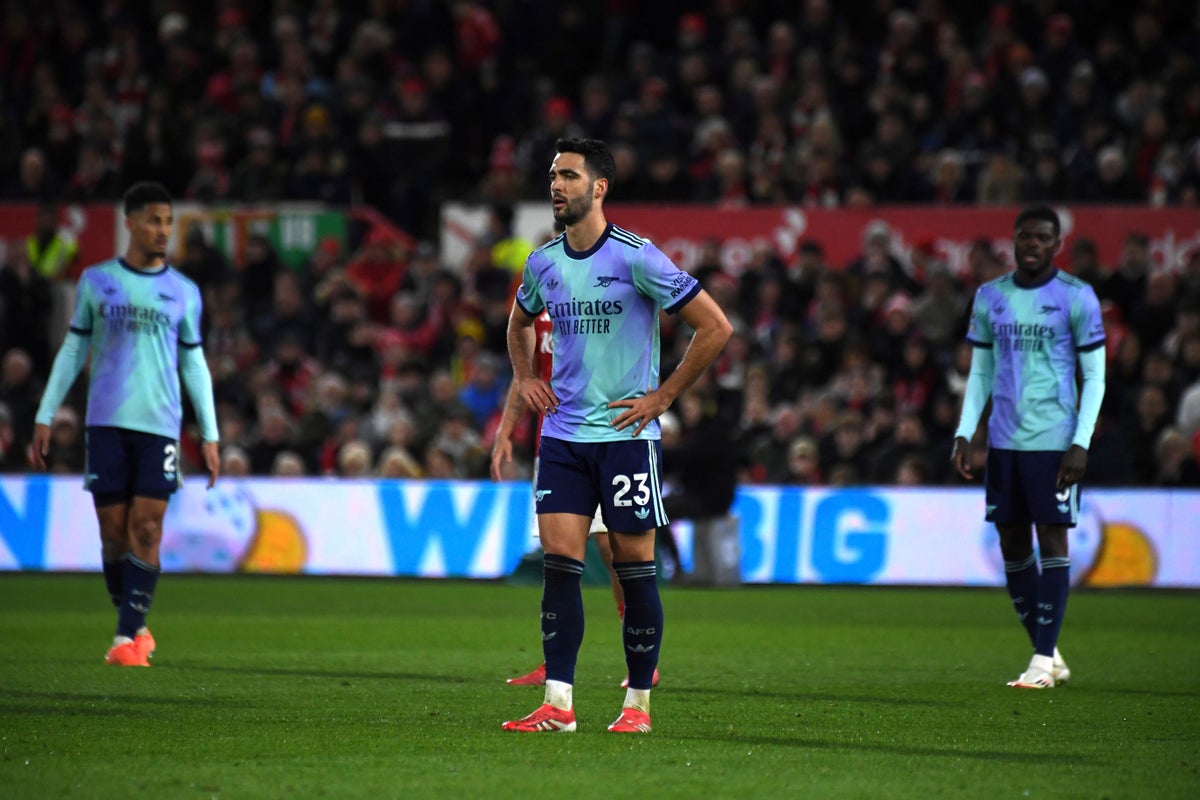 Arsenal hand advantage to Liverpool in title race as Man City edge past ...