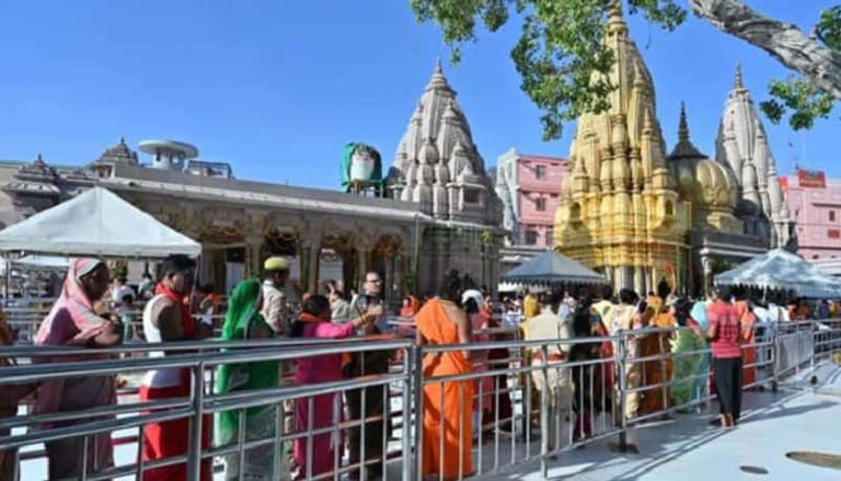 Flower shower for Naga Sadhus, Saints, and devotees at Kashi Vishwanath ...