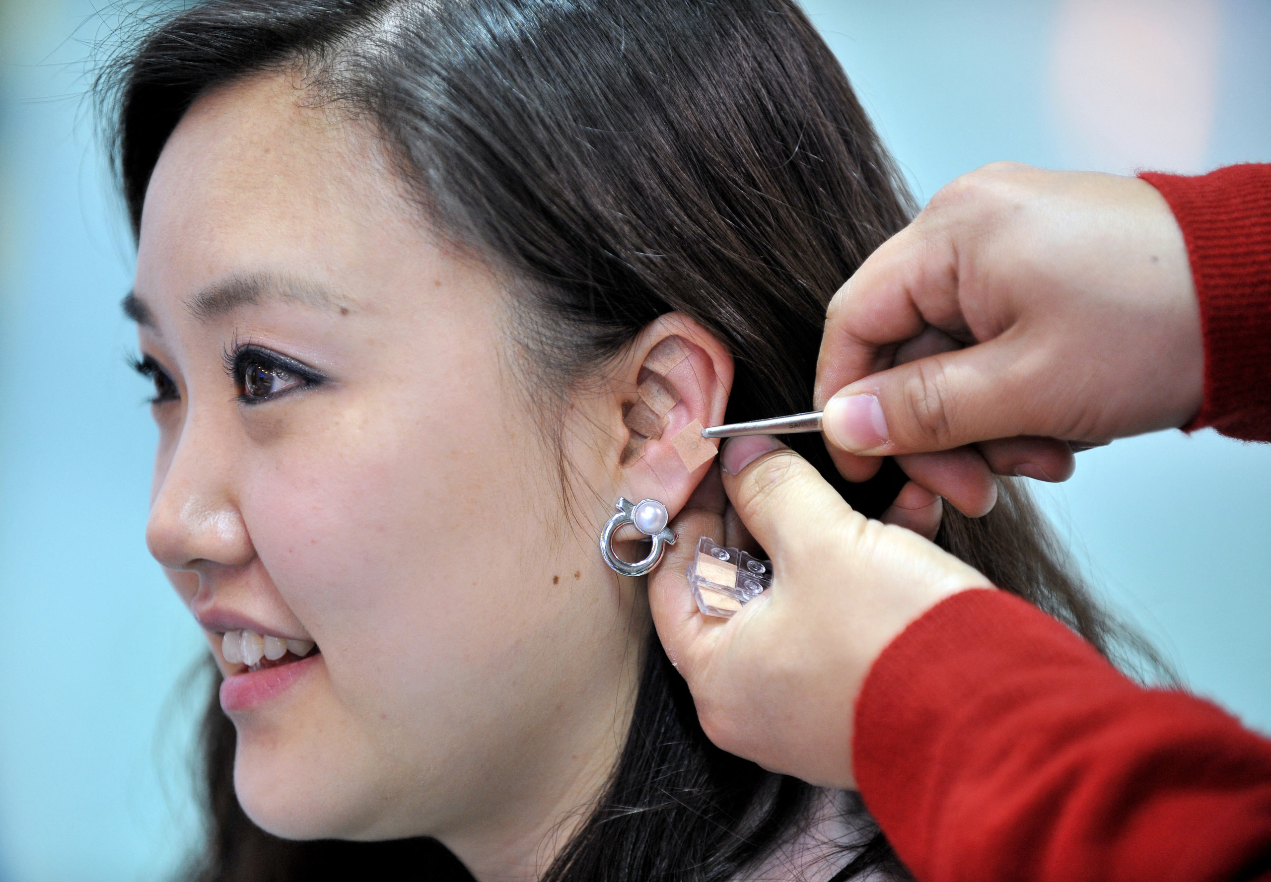 What are ear seeds, and how do they work?