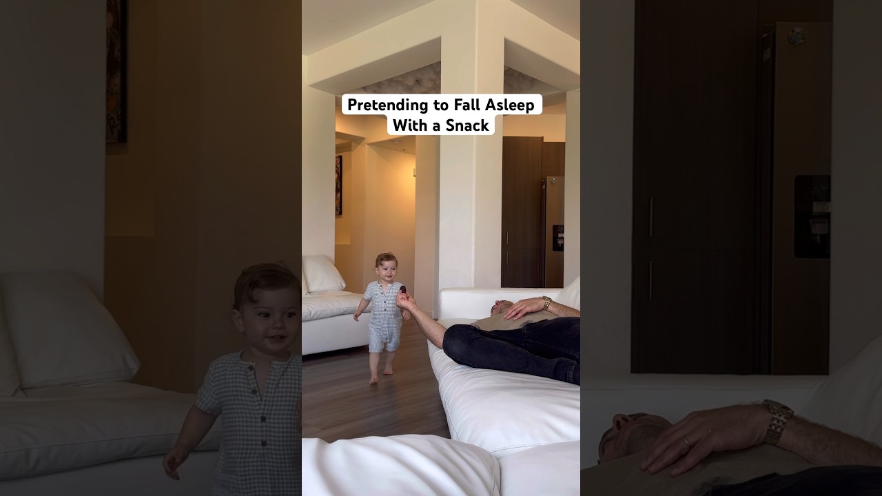 Watch what happens when dad pretends to fall asleep holding a snack