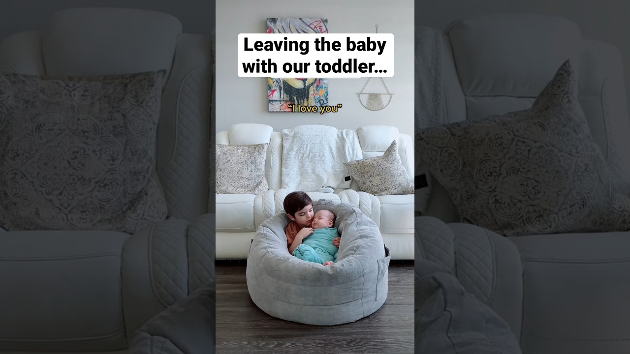 Toddler left with baby shows big brother skills