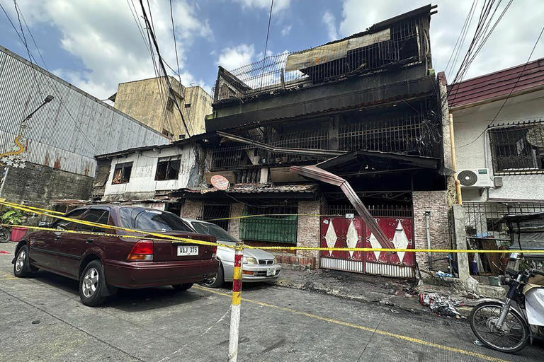 Fire that gutted building in less than an hour kills 8 in the Philippines