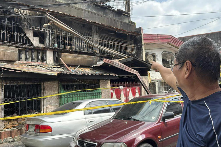 Fire that gutted building in less than an hour kills 8 in the Philippines